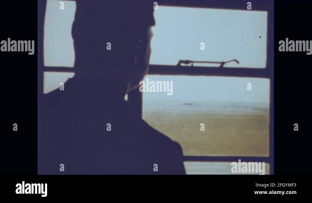 WW2 - Allied soldiers looking outside a window on returning B-17 ...