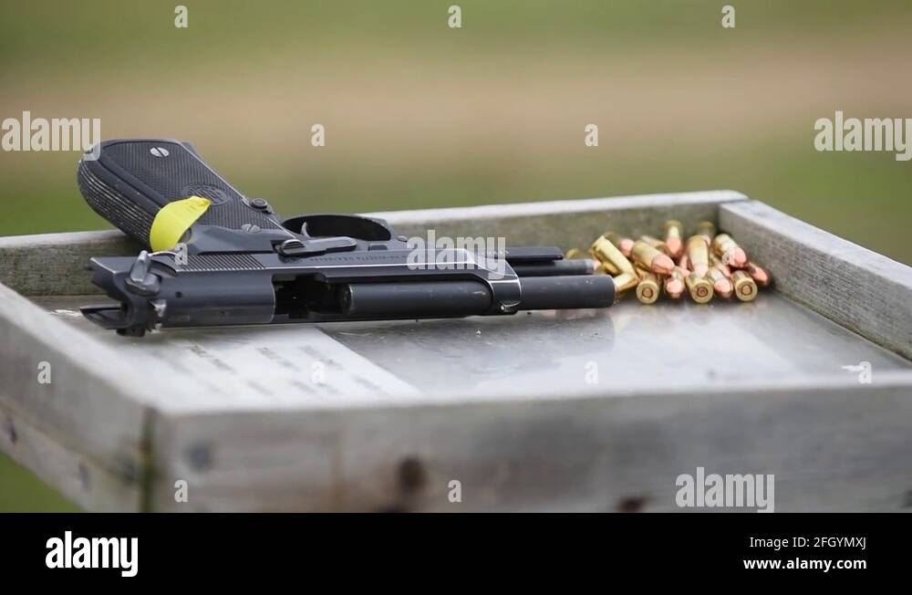 Soldier loading gun with filled magazine, aiming and shooting - 2017 ...