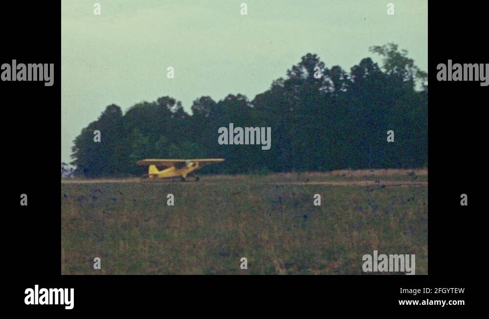 1940s: Single engine plane takes off from runway. Single engine plane ...