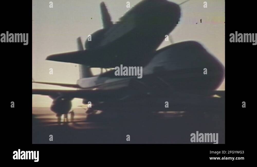 1980s: Space shuttle Enterprise, mounted on a Boeing 747, parked at a ...