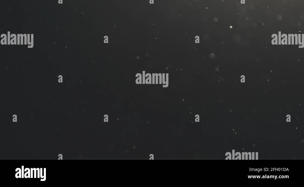 real dust particles floating in air shot wide open with beautiful bokeh ...