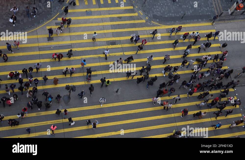 Busy pedestrian crossing and traffic, Hong Kong Stock Video Footage - Alamy