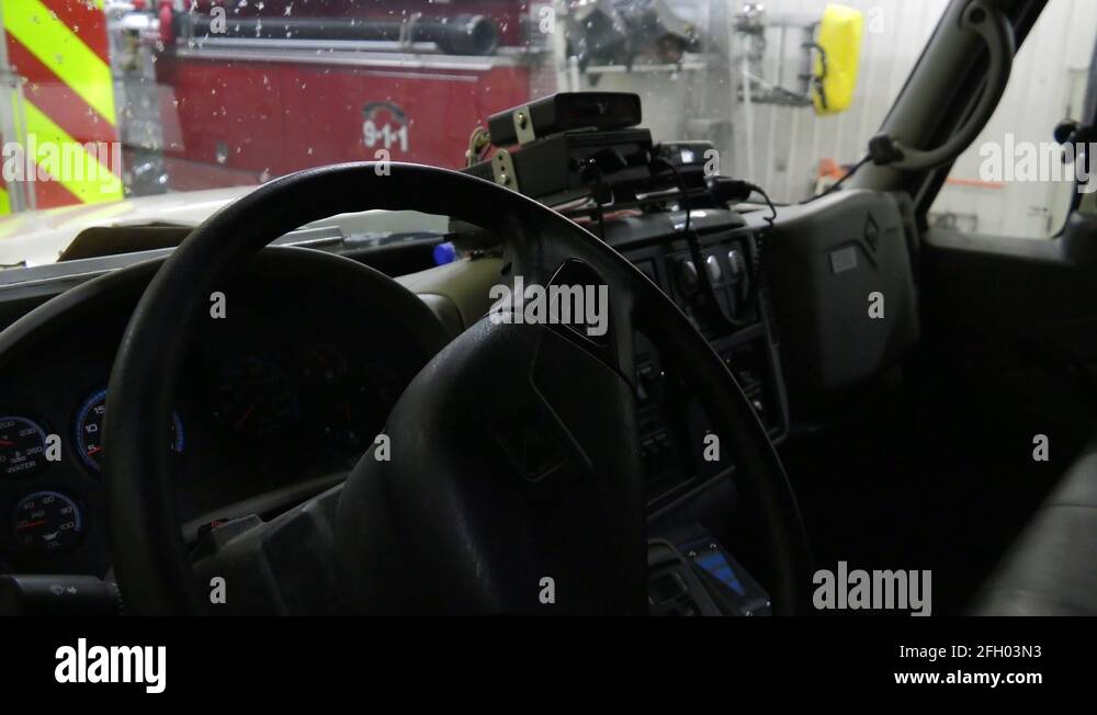 fire truck cockpit zoom into 911 logo 4k Stock Video Footage - Alamy