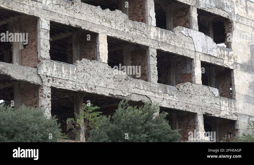 Bullet holes in multi storey building, a stark reminder of Bosnian war ...
