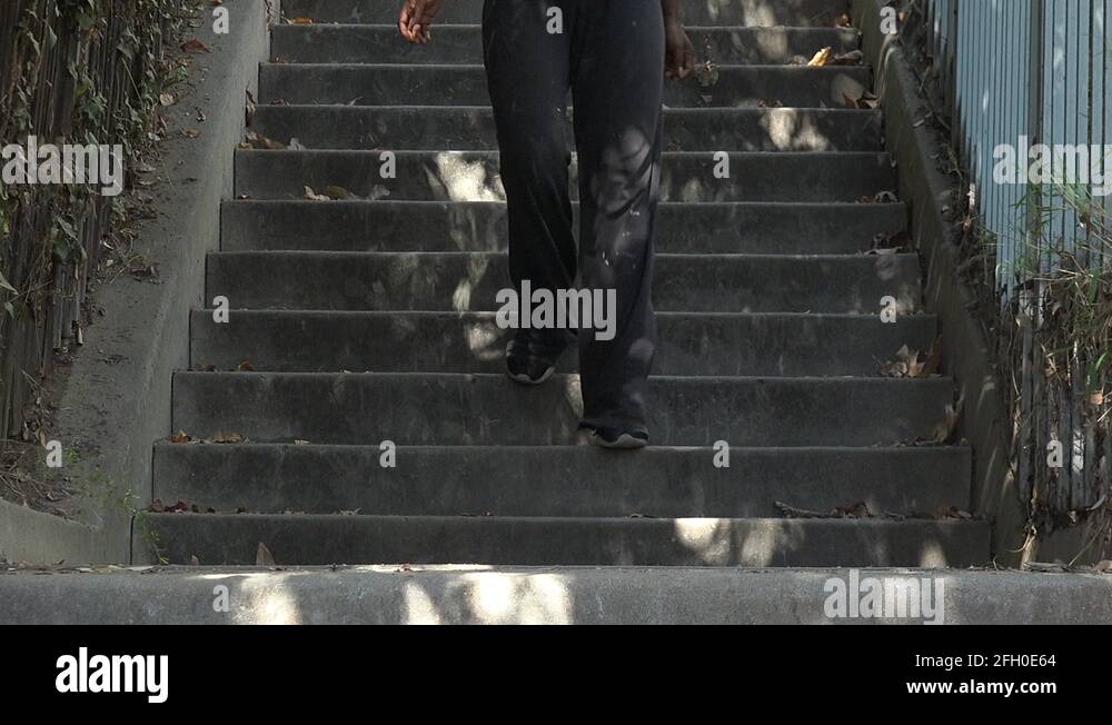 A woman descending a staircase Stock Videos & Footage - HD and 4K Video Clips - Alamy