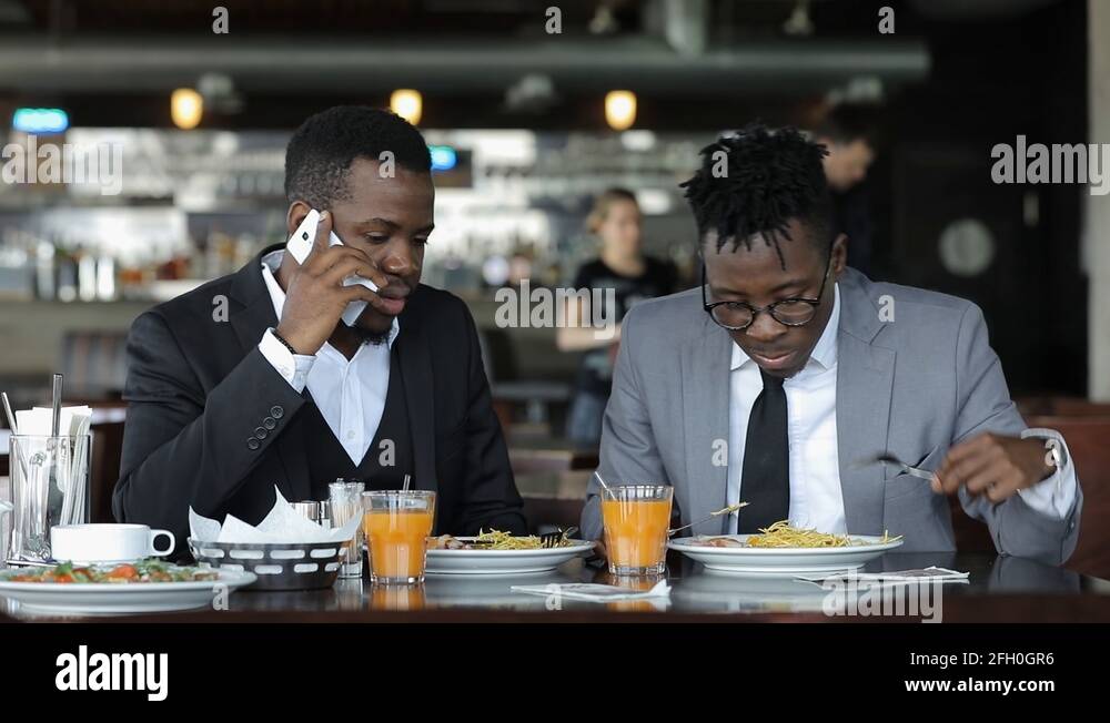 Two men eating unhealthy food Stock Videos & Footage - HD and 4K Video ...