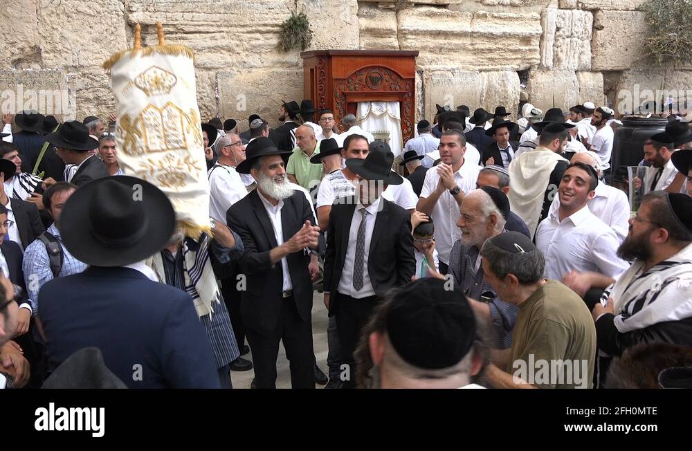 Jewish Orthodox men dance around Torah Scroll at Western Wall Stock ...