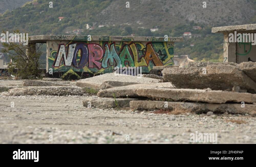 Graffiti painted on rooftop of infamous 'sniper tower' in Mostar ...