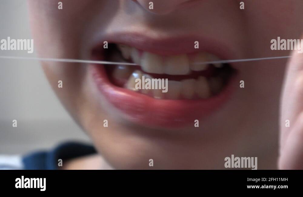 Boy flossing teeth Stock Videos & Footage - HD and 4K Video Clips - Alamy