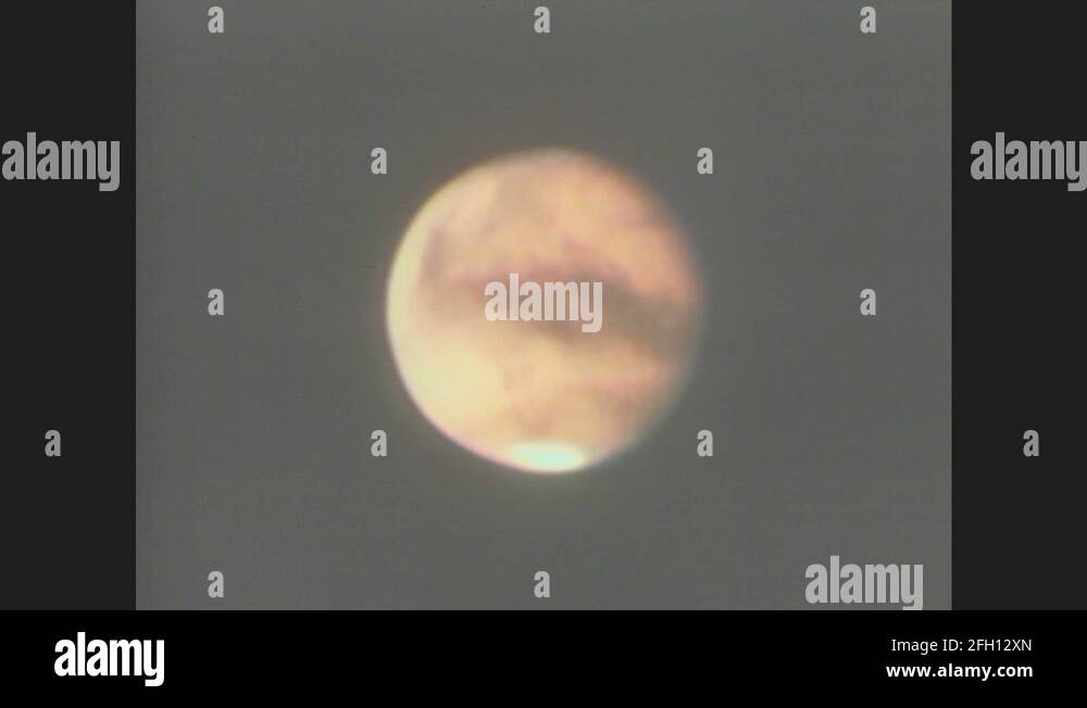 1970s: Photograph of Mars. A yellow circular line shows the shape of ...