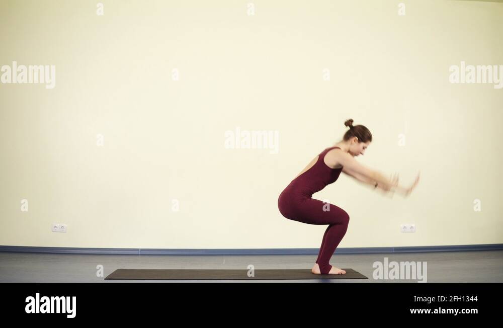 Young Spotive Woman With Flexible Body Stretches Out Muscles And Does Stock Video Footage Alamy
