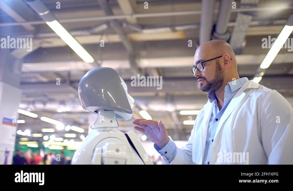Man expressing love to a female robot. robot and human emotions ...