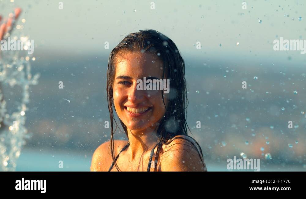 Woman splashed water Stock Videos & Footage - HD and 4K Video Clips - Alamy