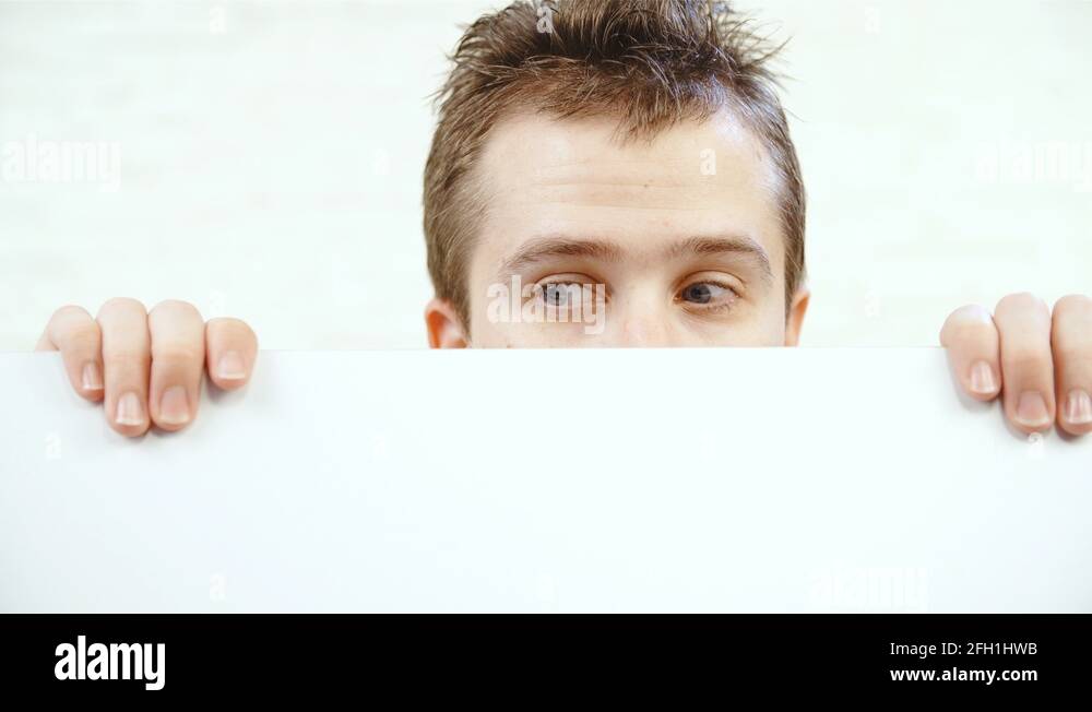 Man spying wall Stock Videos & Footage - HD and 4K Video Clips - Alamy