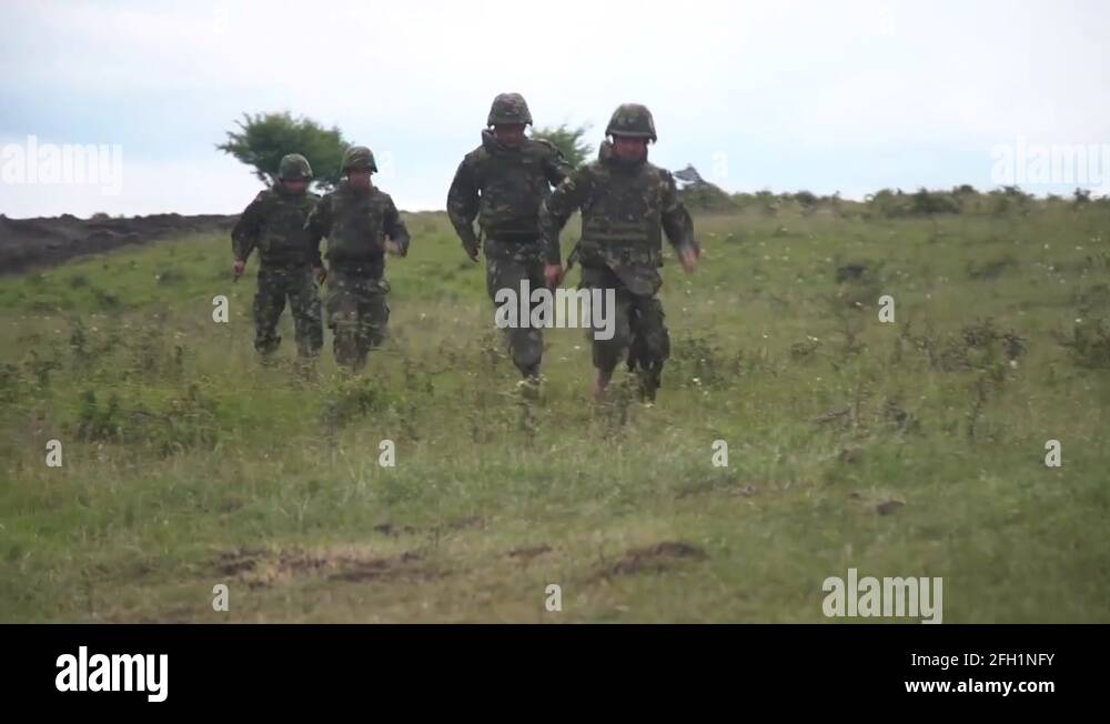 Romania land force runs into the trenches and operates recoilless rifle ...