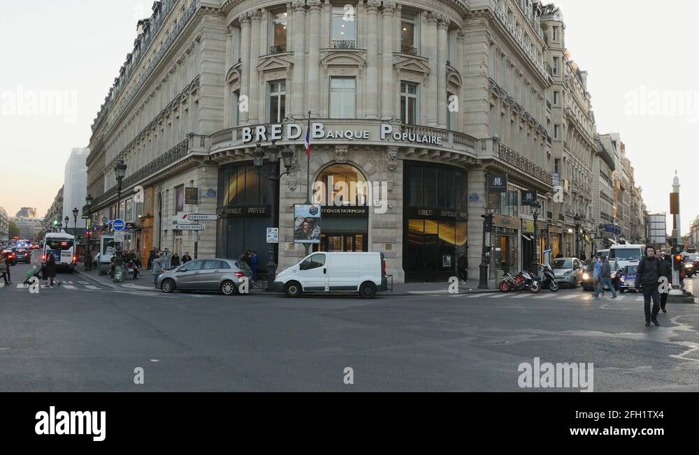 Beatiful historic building with a shop in it in a round intersection in ...