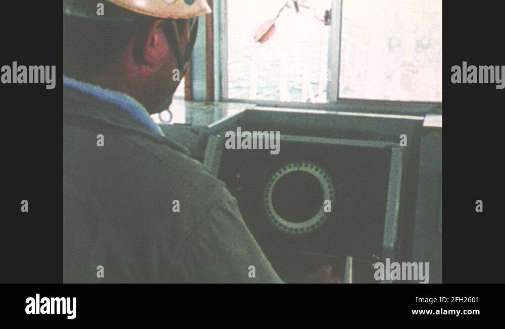 1980s: Man drives ship. Finger turns dial. Sail unfolds and rotates ...