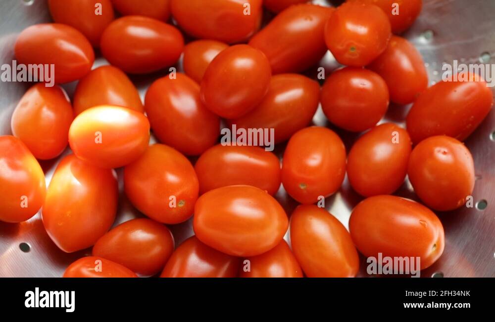 Whole raw grape tomatoes Stock Videos & Footage - HD and 4K Video Clips ...
