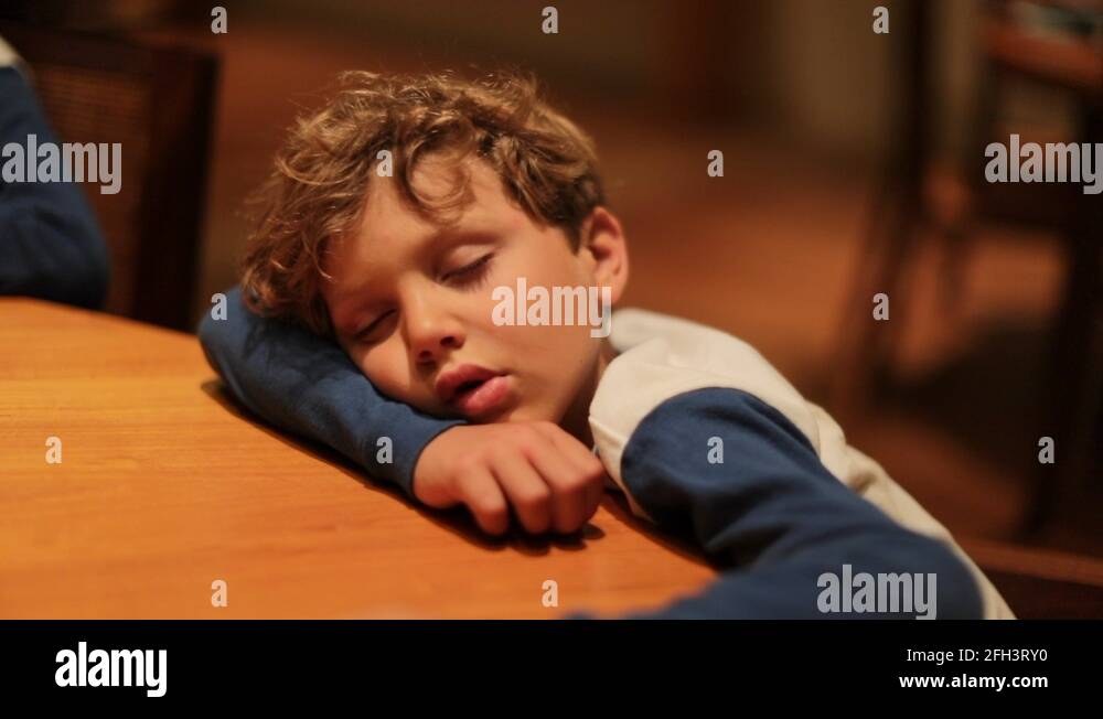 Kid asleep at desk Stock Videos & Footage - HD and 4K Video Clips - Alamy