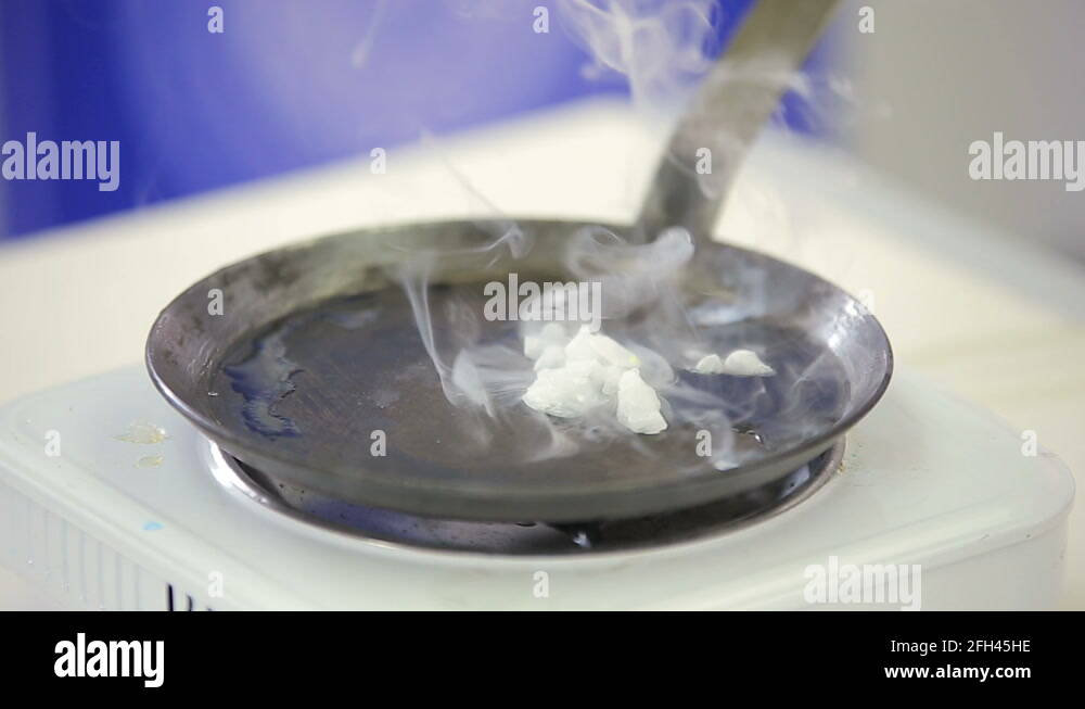 Dry ice melting and evaporating Stock Video Footage - Alamy
