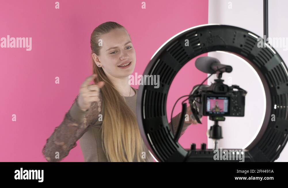 Teen girl vlogger recording vlog for her lifestyle channel at home ...