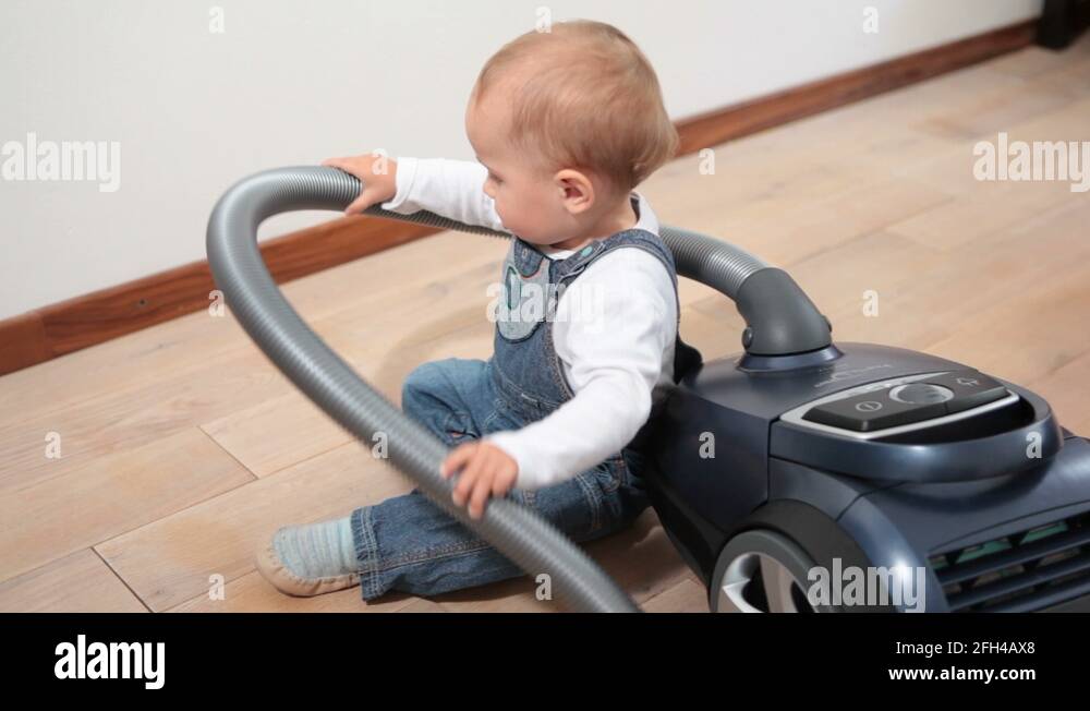 Baby vacuum cleaner Stock Videos & Footage - HD and 4K Video Clips - Alamy