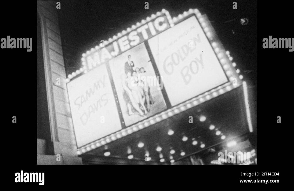 1960s: Lighted signs on Broadway in New York city. Neon signs on city ...