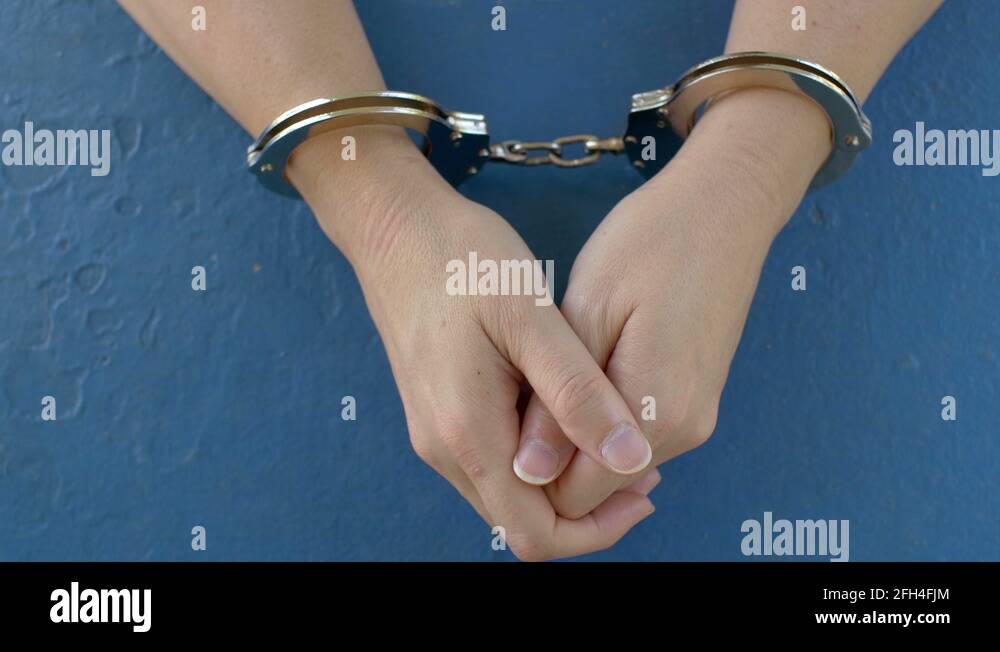 Wrists handcuffs Stock Videos & Footage - HD and 4K Video Clips - Alamy