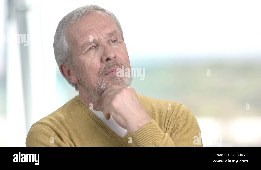 Close up thinking man on blurred background Stock Video Footage - Alamy