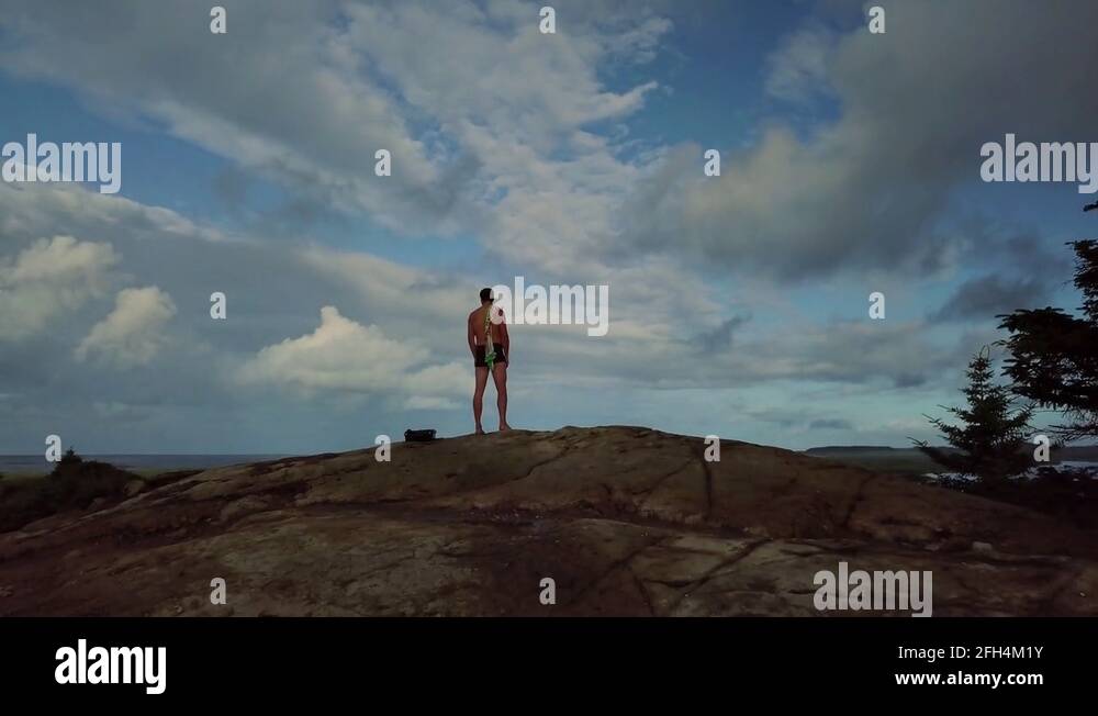 Man standing on stone at seaside Stock Videos & Footage - HD and 4K ...