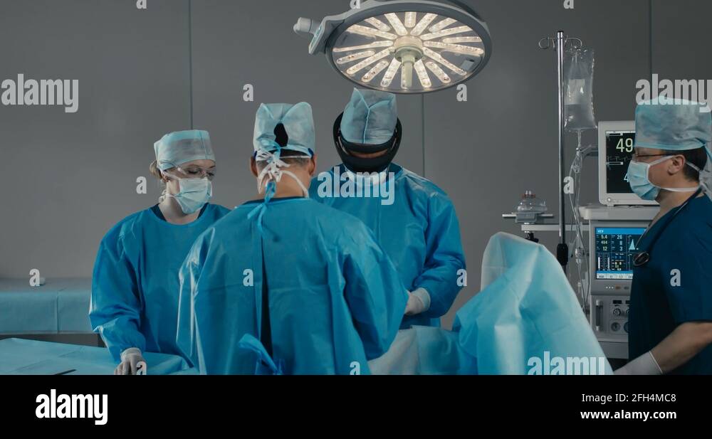 Team of surgeons using augmented reality hololens headset during ...