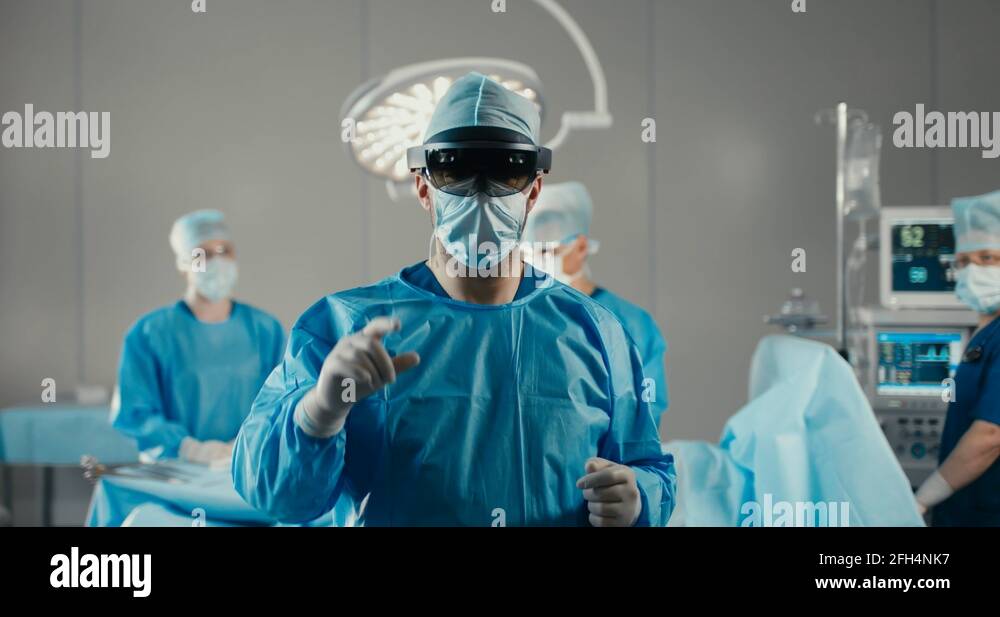 Portrait of surgeon using augmented reality hololens headset during ...