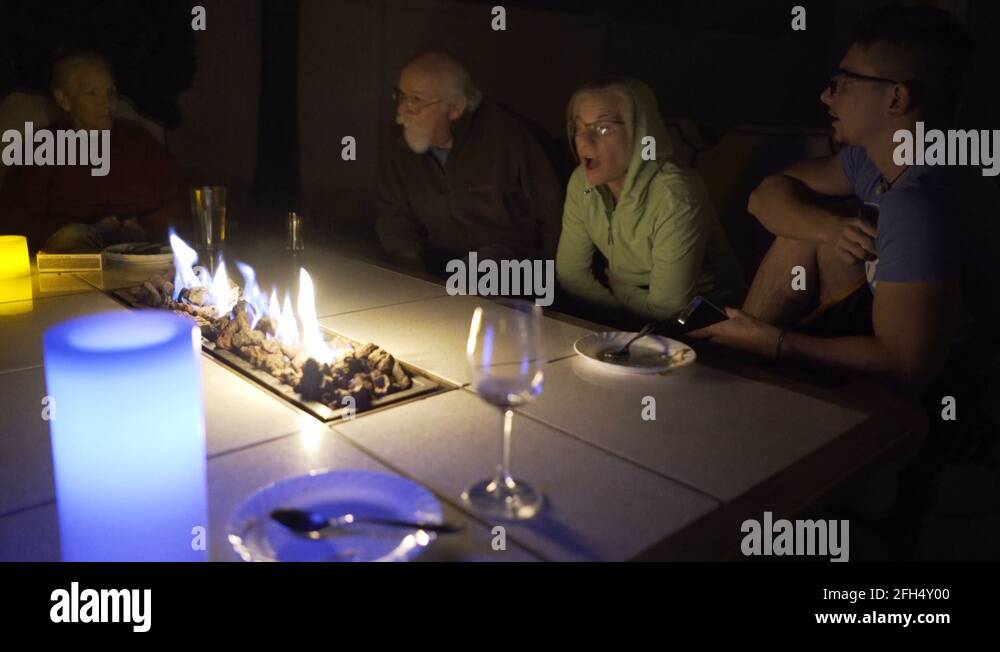 Family sitting around fire Stock Videos & Footage - HD and 4K Video ...