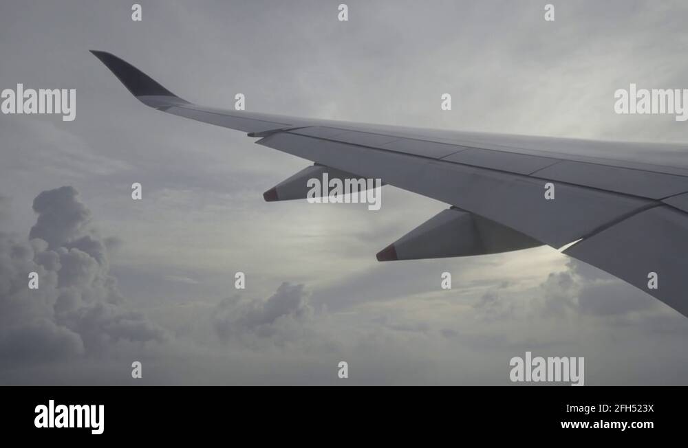 In-Flight Modern Airbus A350 Passenger Airplane Flying in the Sunset ...