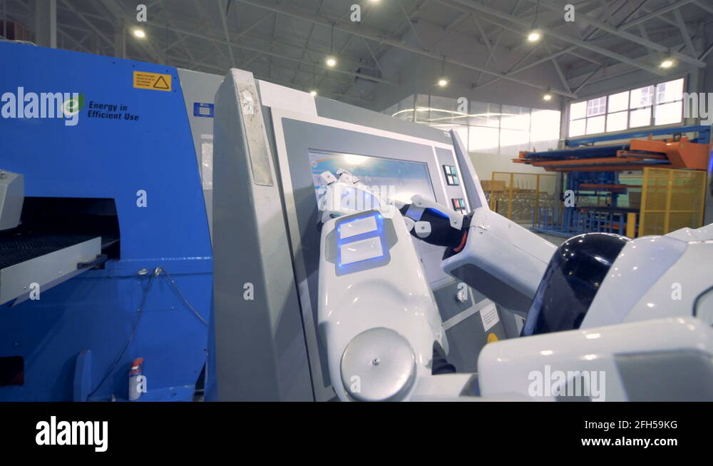Robot set up industrial factory equipment using touchscreen. 4K Stock ...