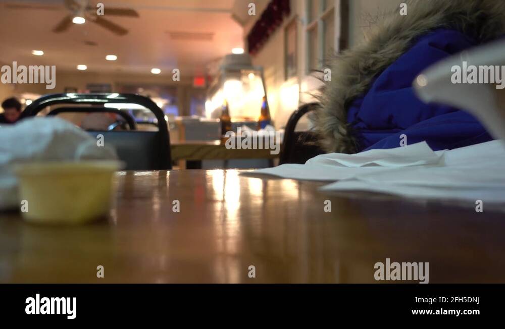 4K Man Eating In Restaurant With Empty Table And Jacket Stock Video ...