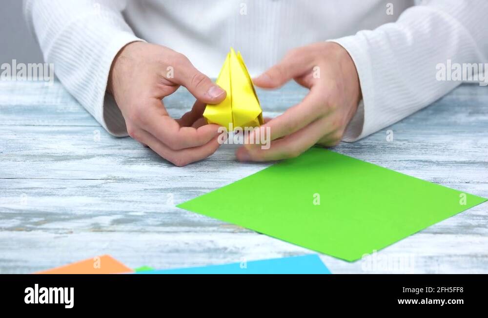 Hands folding origami Stock Videos & Footage - HD and 4K Video Clips ...