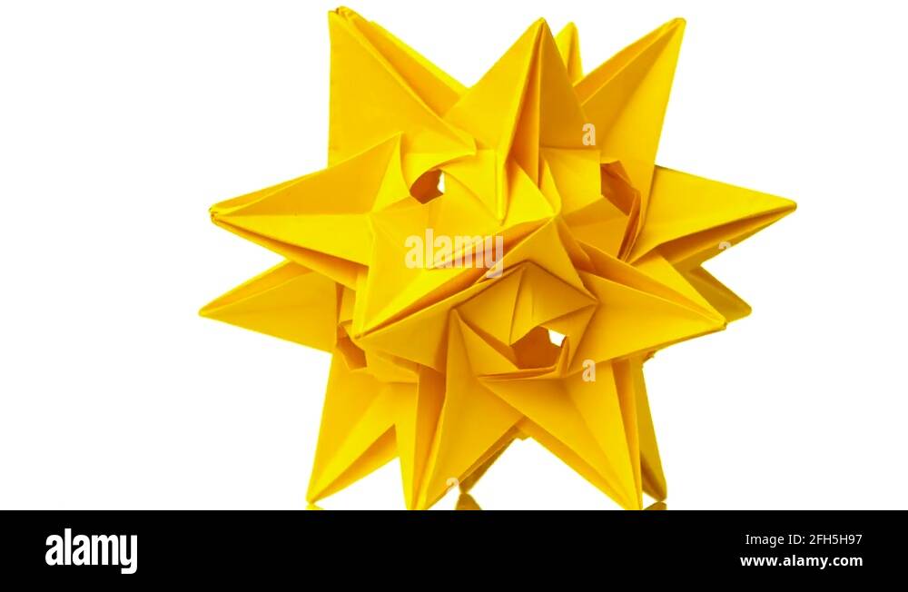 Spiky origami model of yellow color Stock Video Footage - Alamy