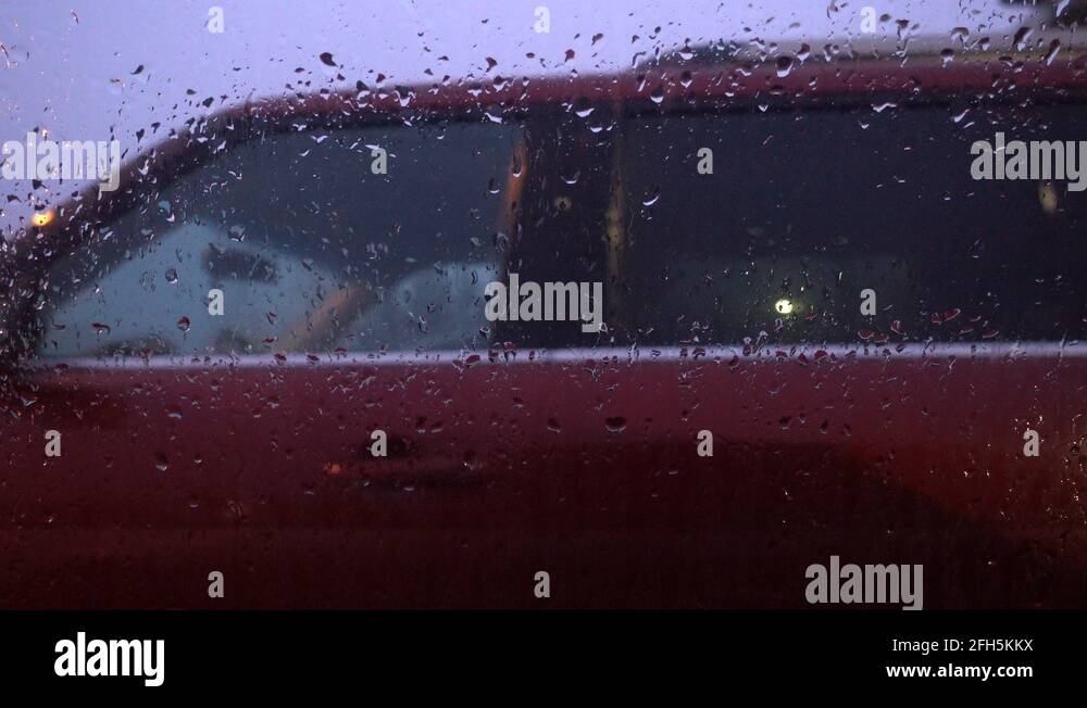 4K Pulling Out Of Parking Lot With Rainy Window And Blurry Cars Stock ...