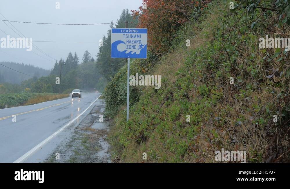 Rain Storm LEAVING TSUNAMI HAZARD ZONE sign Stock Video Footage - Alamy