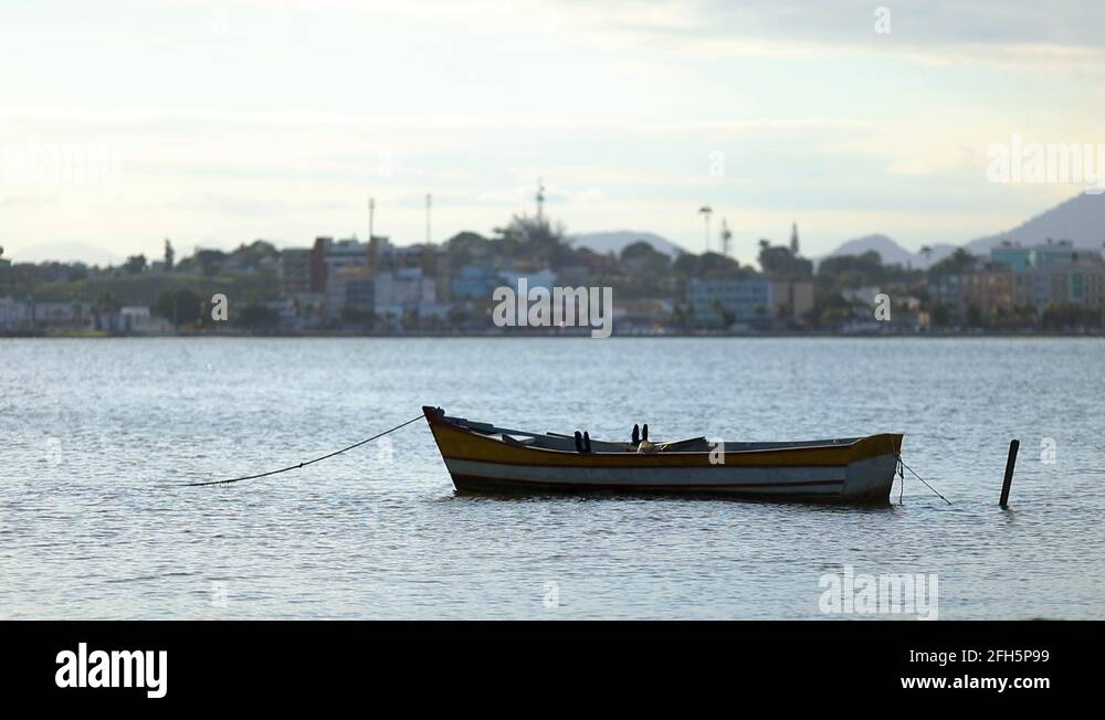 Boat tied to a pole Stock Videos & Footage - HD and 4K Video Clips - Alamy
