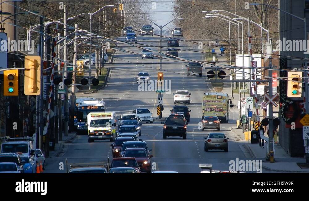 4K Traffic At Intersection With Homeless Person 4 Stock Video Footage ...