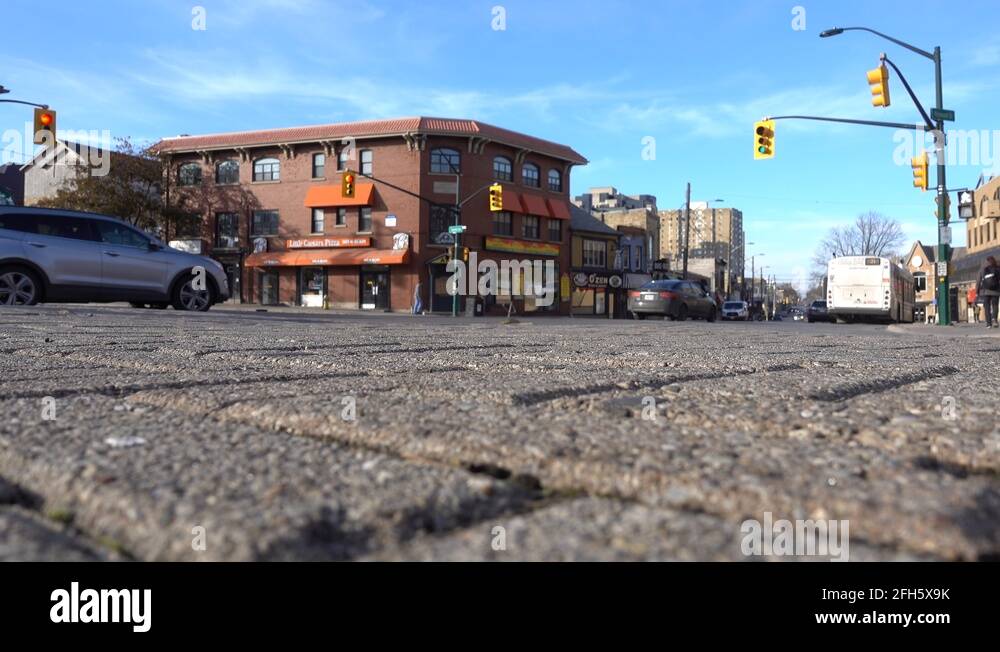 4K Street View Traffic At Intersection With People Walking And ...