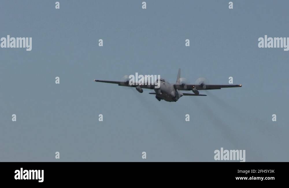 Lockheed C-130 Hercules flies in mid-air - 2016 Stock Video Footage - Alamy
