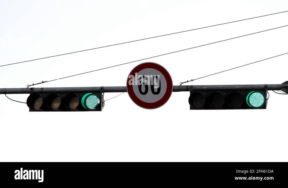 Traffic lights and speed limit sign Stock Video Footage - Alamy