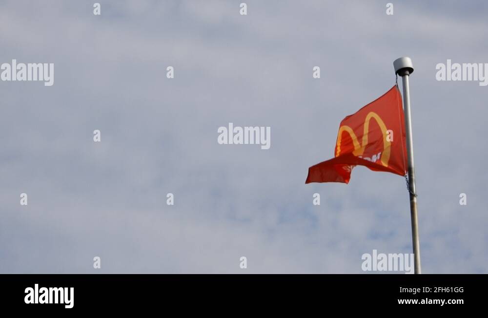 4K McDonald's Flag From Behind Waving And Blowing In Windy Sky Stock ...