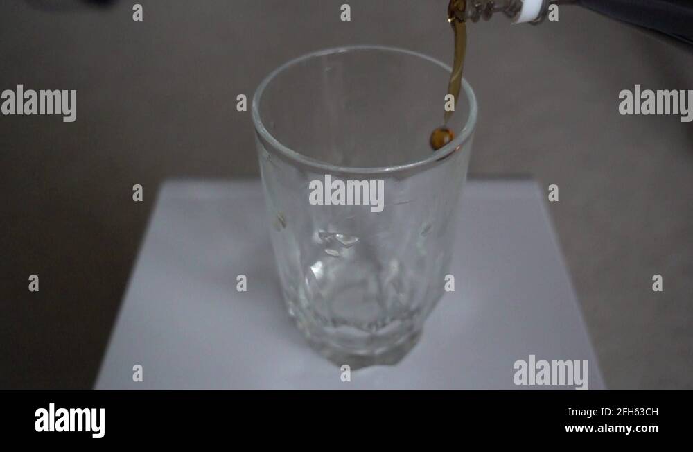 Spilling Cola Coke Rootbeer Into Glass Then Finishing Slow Motion Stock ...