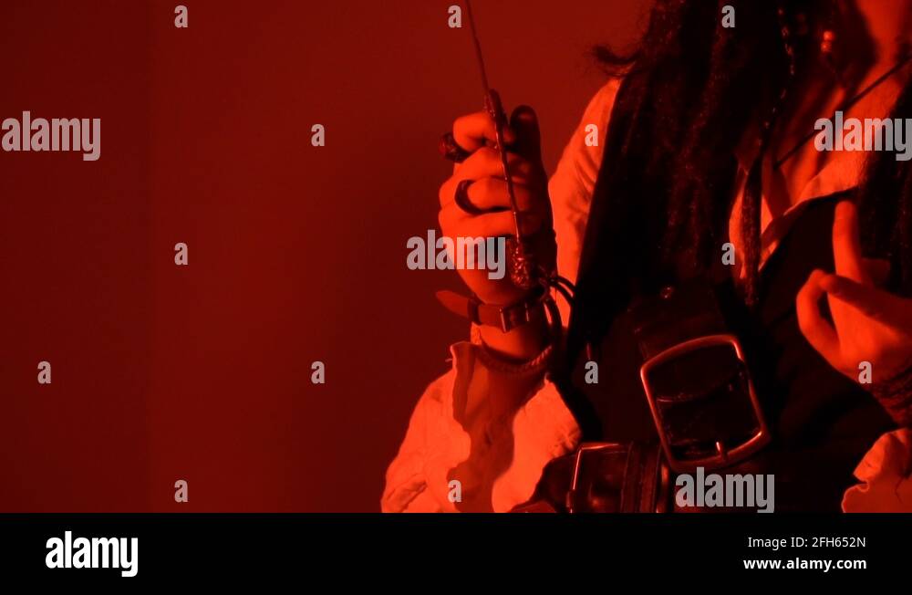 Man holding dagger Stock Videos & Footage - HD and 4K Video Clips - Alamy