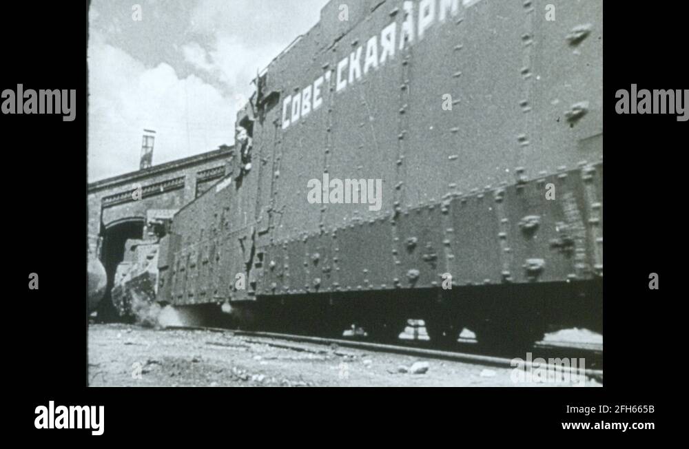 1940s: Armored military train cars roll down tracks. Illustrated map of ...
