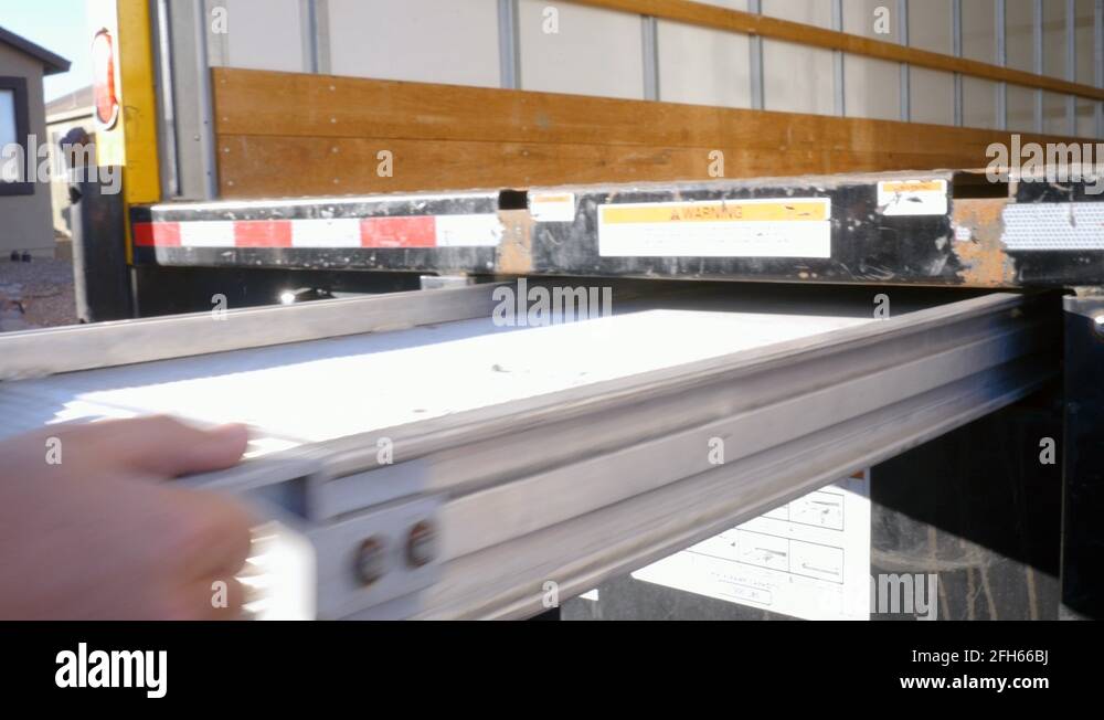 Man pulling a truck Stock Videos & Footage - HD and 4K Video Clips - Alamy